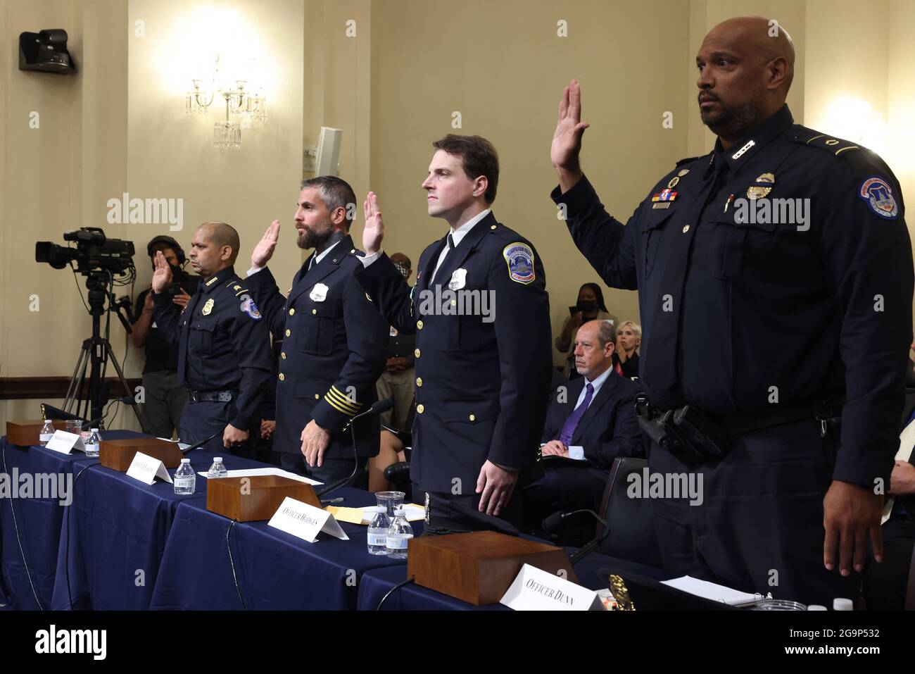 (L-R) Sgt. Aquilino Gonell of the US Capitol Police, Officer Michael ...