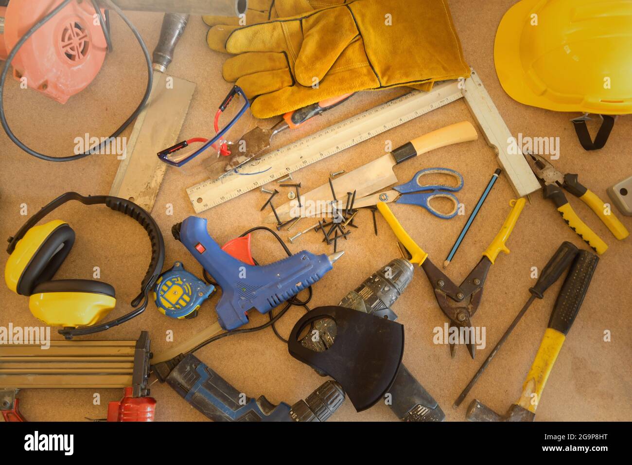 A desk of contractor engineers.collection of working tools on a ...