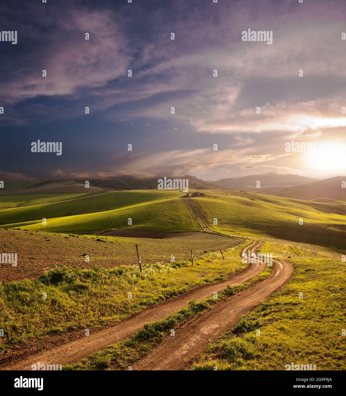 Winding path hills sunset hi-res stock photography and images - Alamy