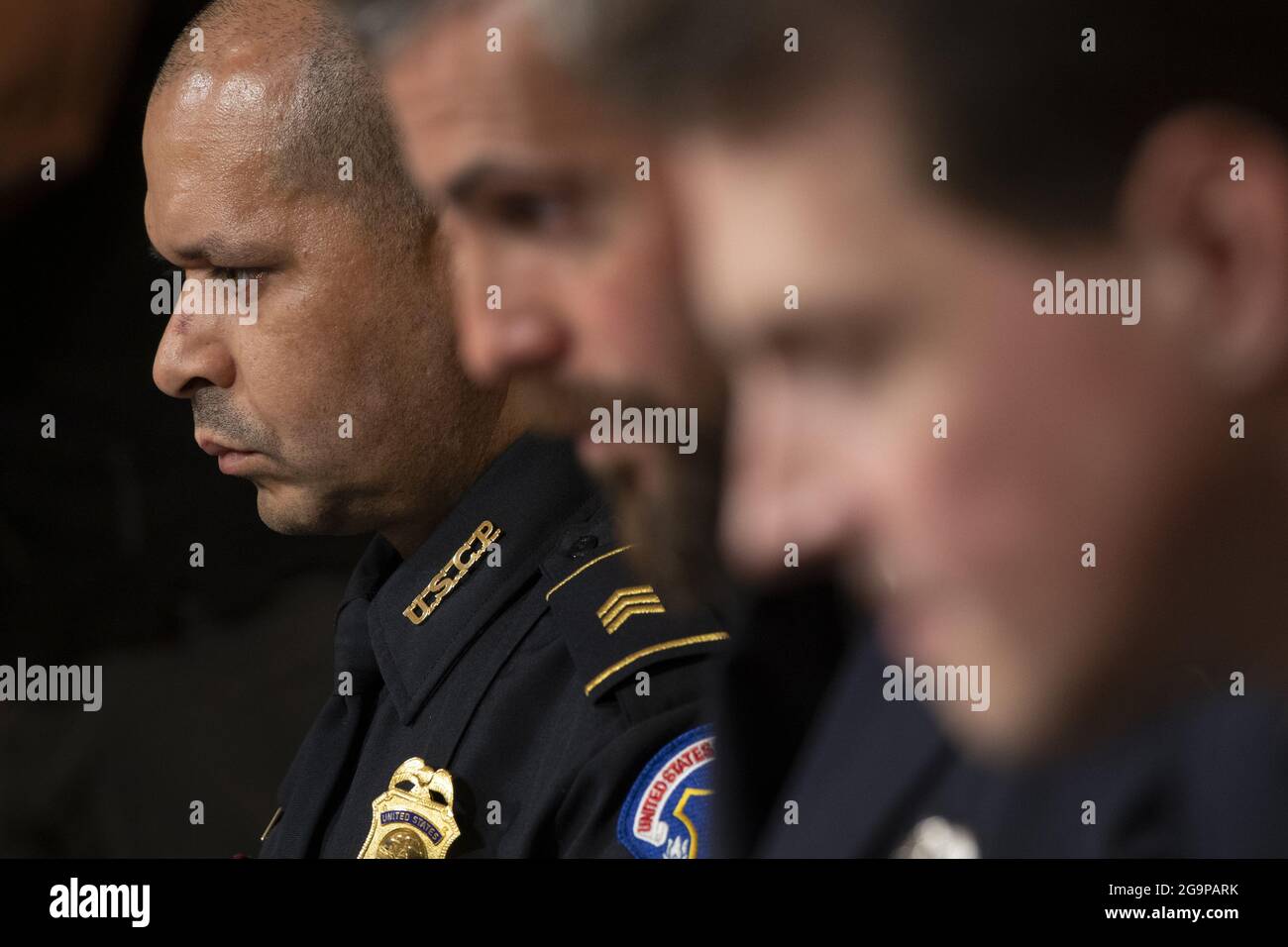 Aquilino Gonell, sergeant of the U.S. Capitol Police, Michael Fanone ...