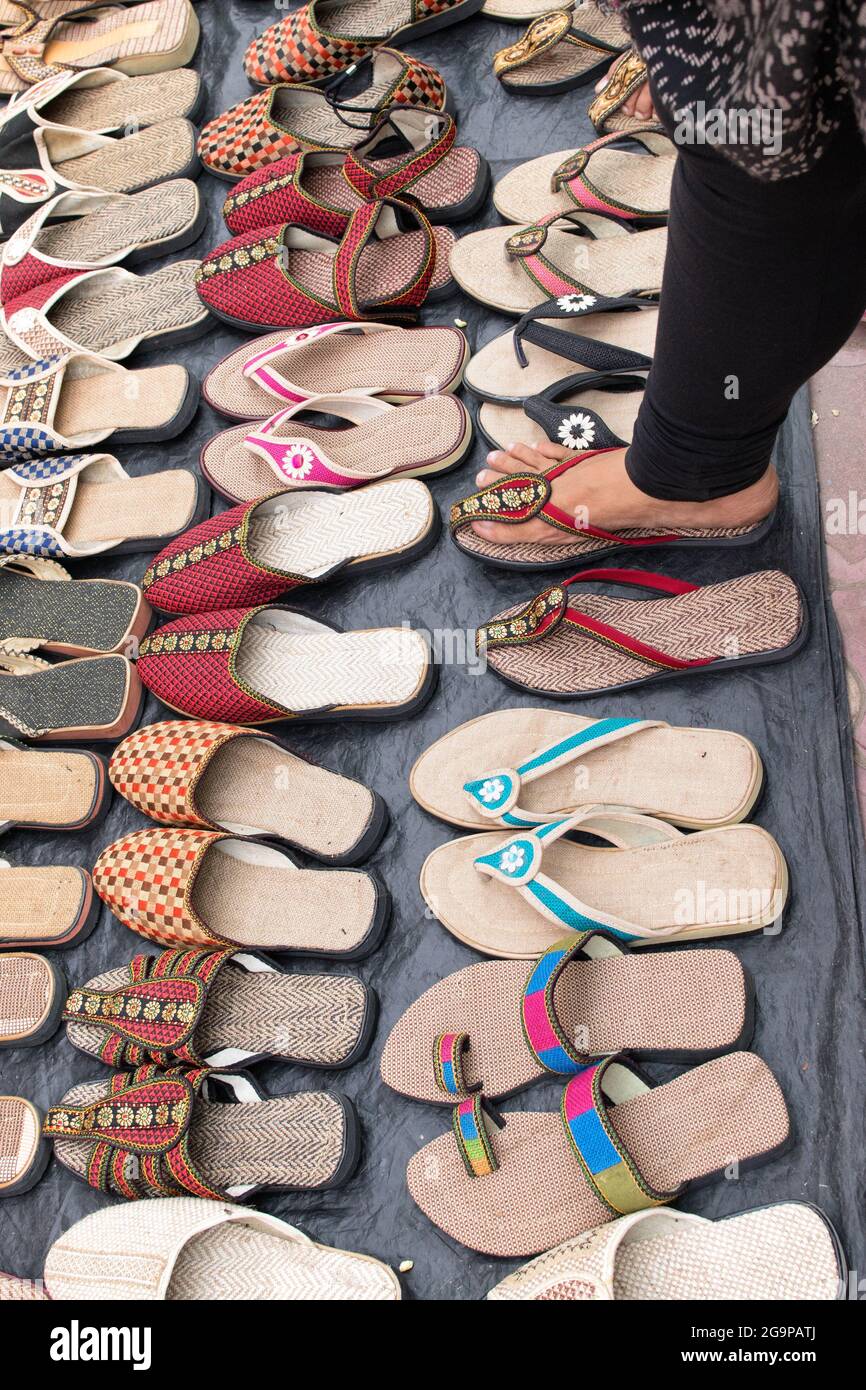 Indian woman making traditional shoes hi-res stock photography and ...