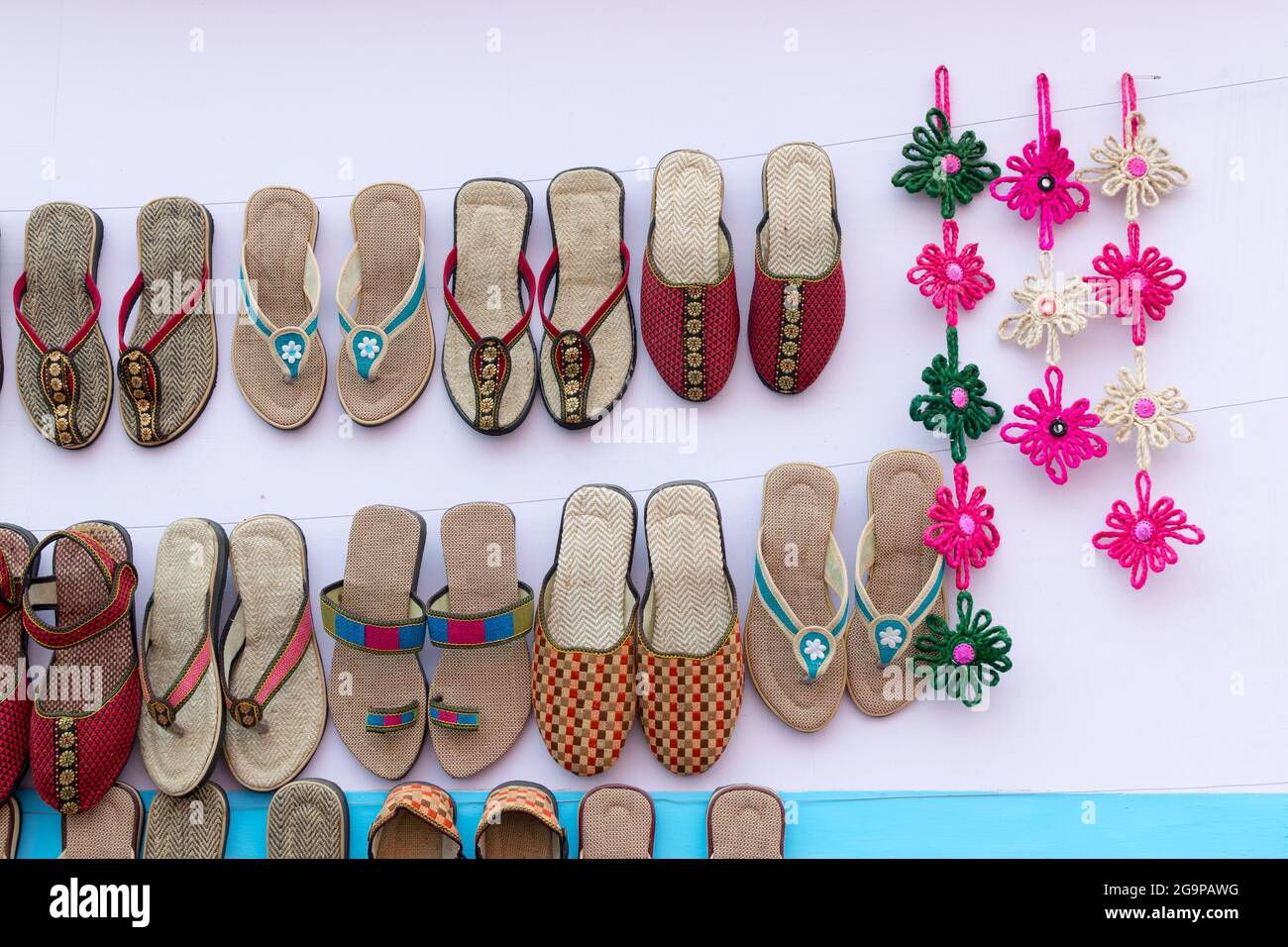 Indian woman making traditional shoes hi-res stock photography and ...
