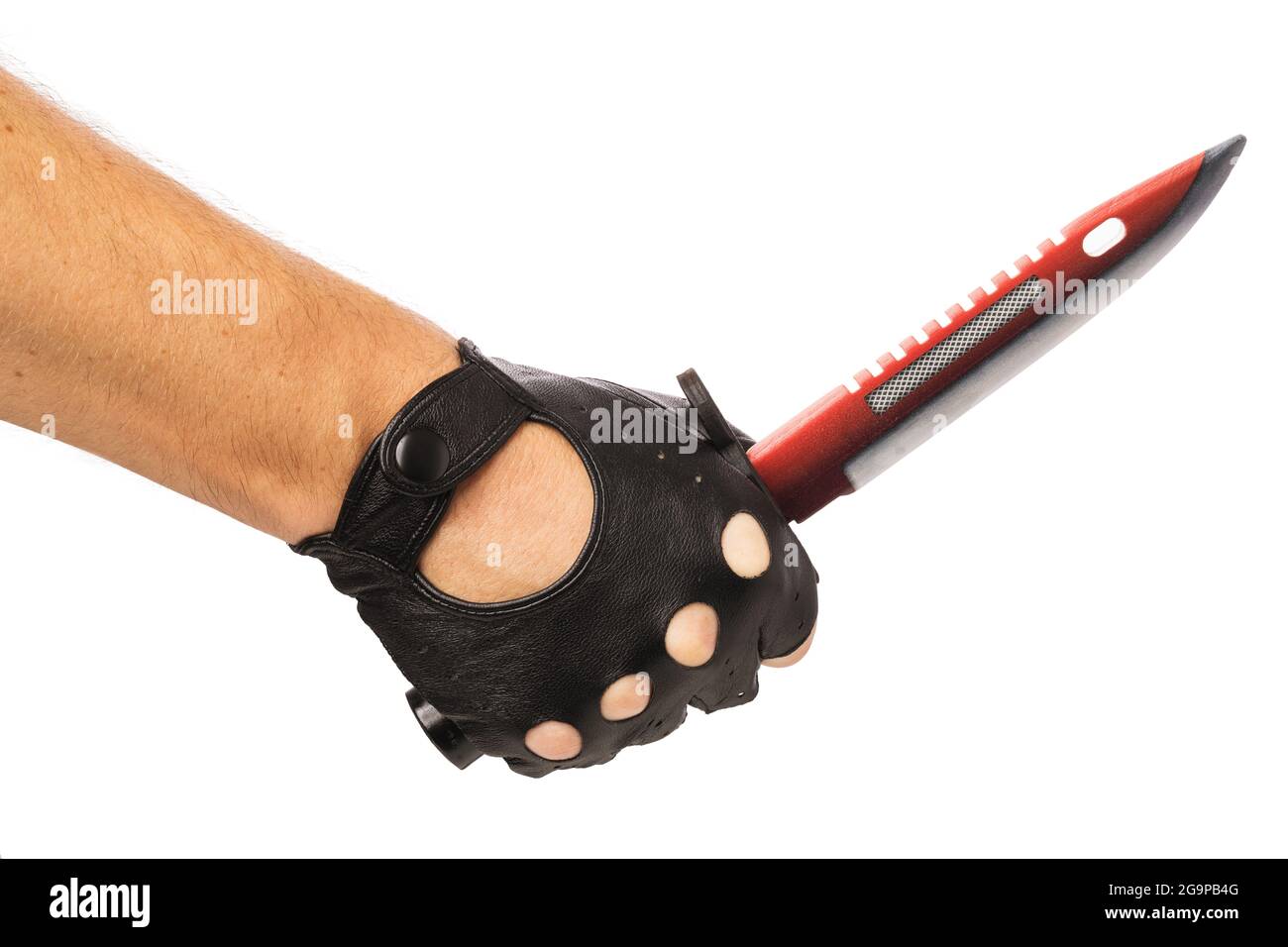 Hand in a glove with a toy wooden knife isolated on a white background ...