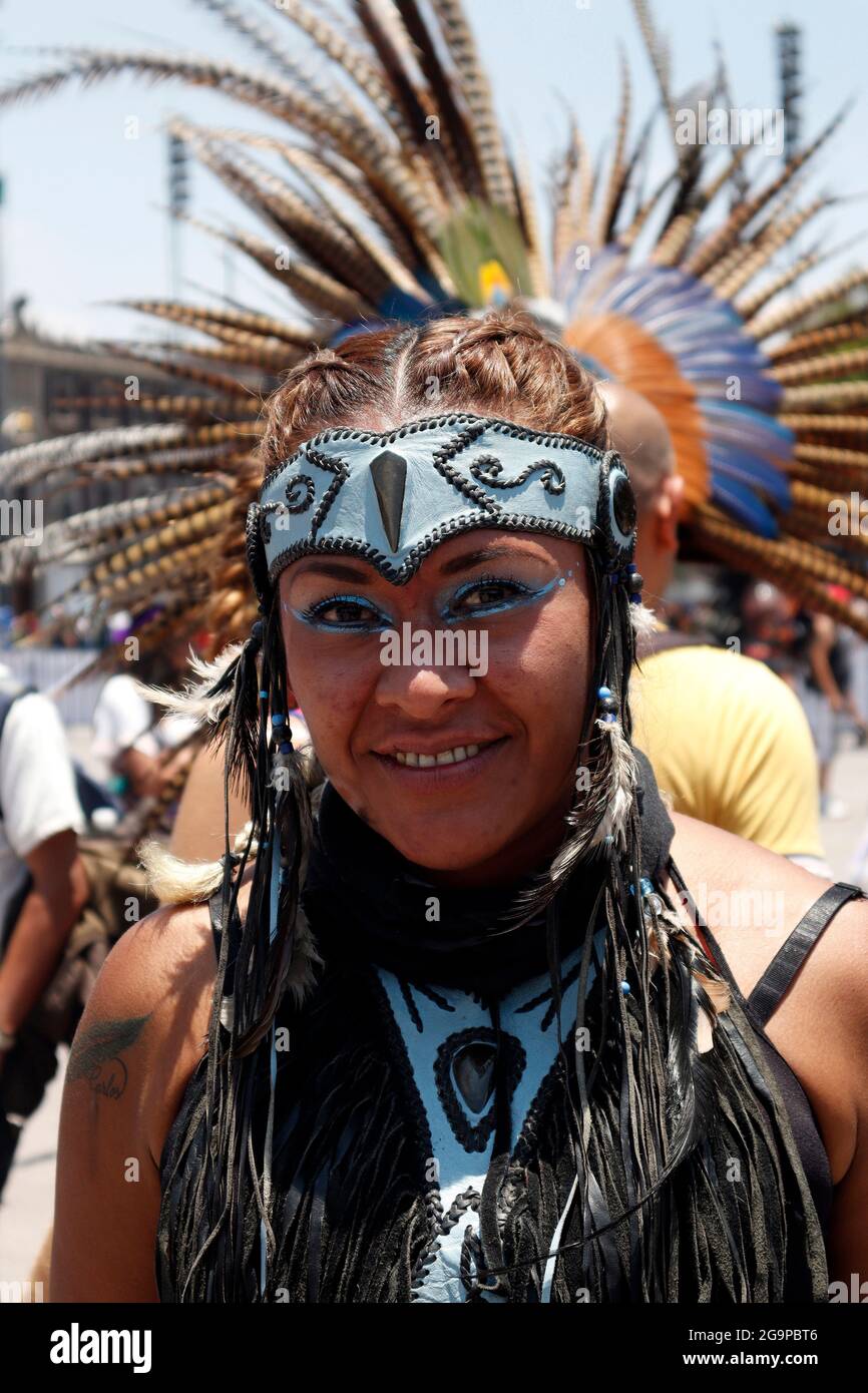 MEXICO CITY, MEXICO - JULY 26: Pre-Hispanic dancers, musicians and ...