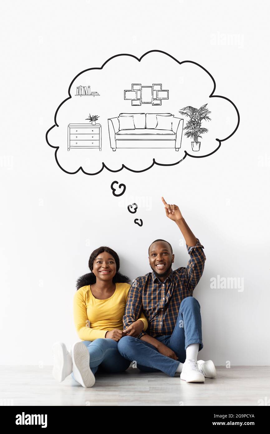Dreamy Young Black Spouses Imagining Furniture In Their New Flat ...