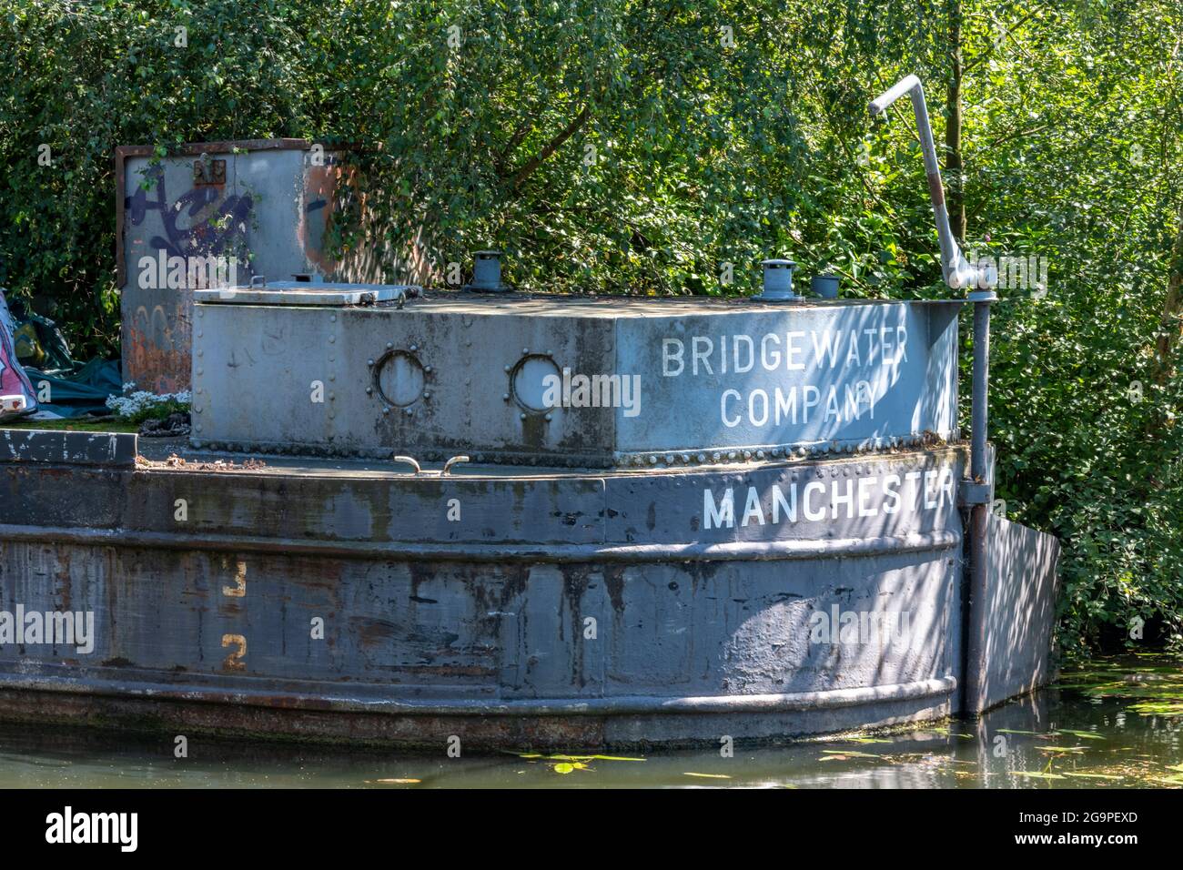 old work boat moored on the towpath of the bridgewater canal near sale ...