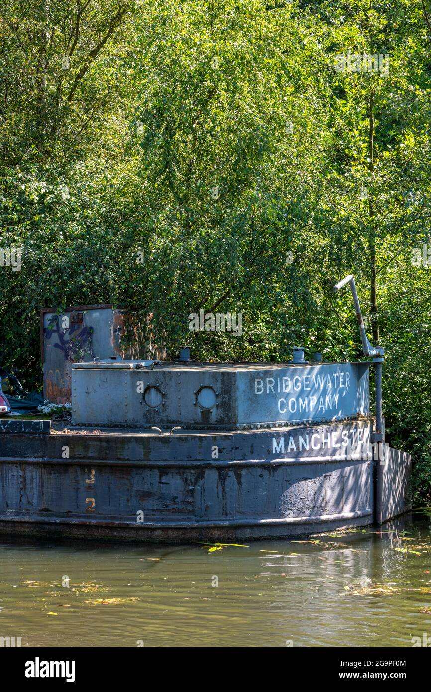 old work boat moored on the towpath of the bridgewater canal near sale ...
