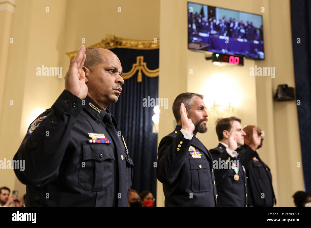 From left, U.S. Capitol Police officer Sgt. Aquilino Gonell, DC ...