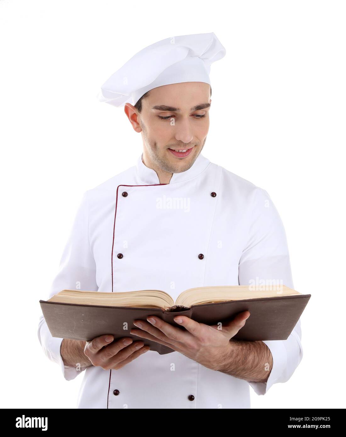 Chef with recipe book in hands isolated on white Stock Photo - Alamy