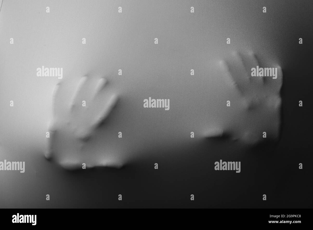 Human hands pressing through fabric as horror background Stock Photo ...