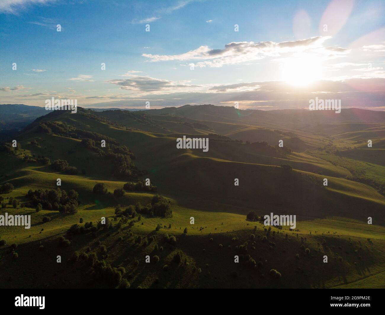 Aerial drone shot of beauty dawn on the peak, in the mountains in Altay ...