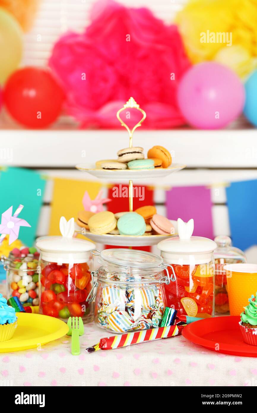 Prepared birthday table with sweets for children party Stock Photo - Alamy