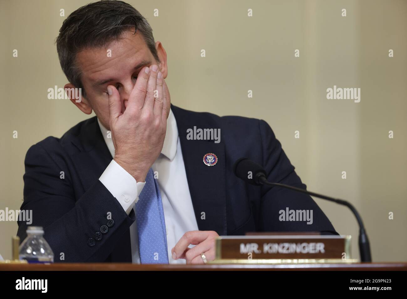 Republican Representative from Illinois Adam Kinzinger reacts as he ...