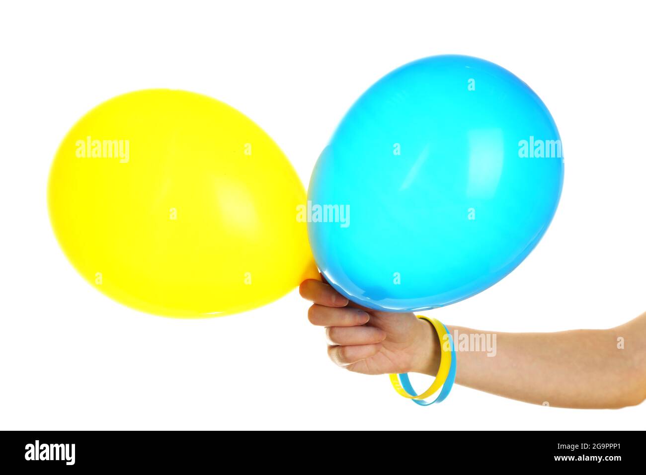 Hand holding blue and yellow balloons, isolated on white Stock Photo ...