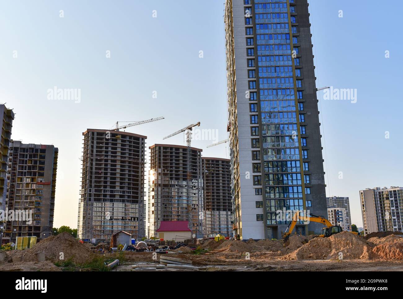 View of a large construction site with buildings under construction and ...
