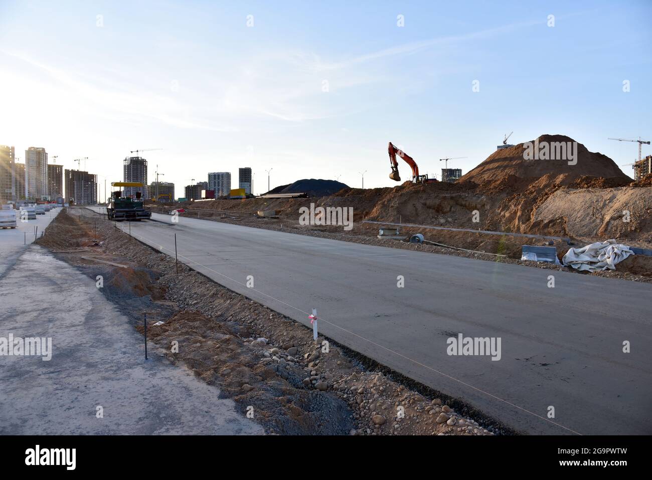 Asphalt paver machine during road work. Road Machinery at construction ...