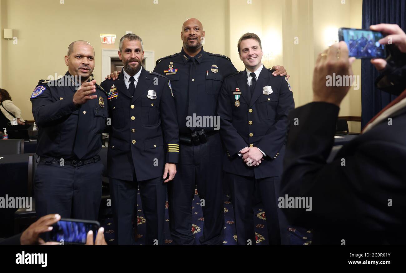 (L-R) Sgt. Aquilino Gonell of the US Capitol Police, Officer Michael ...