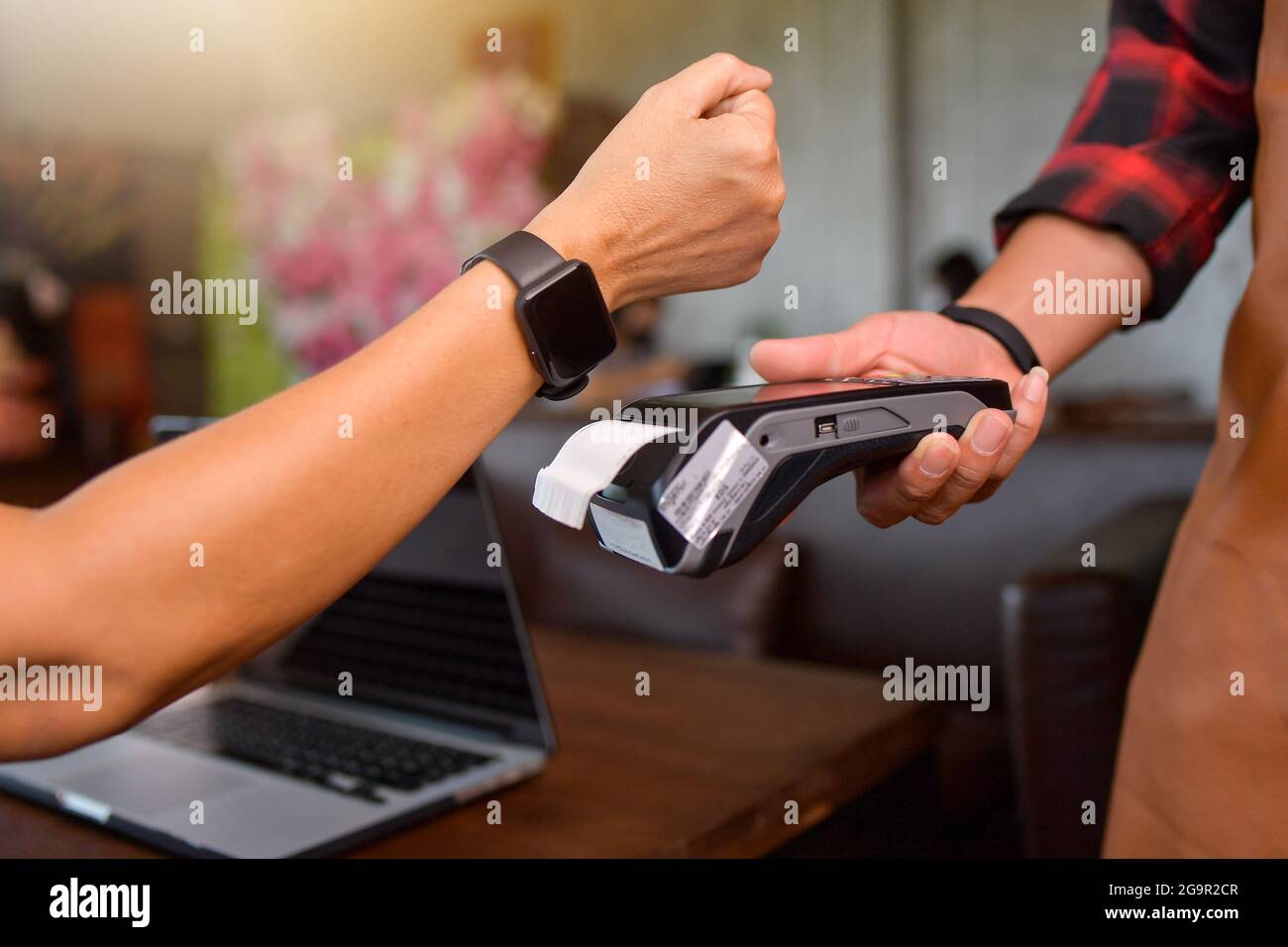 Contactless payment using smartwatch hi-res stock photography and ...
