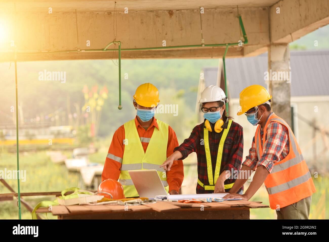 Corona or Covid-19 wear masks during the design of construction. New ...