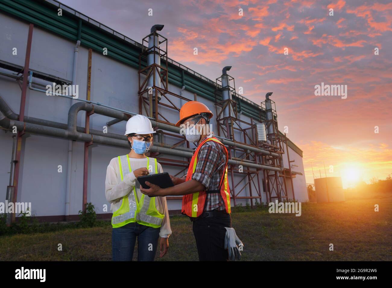 female inspectors and architects discuss with head engineer about ...