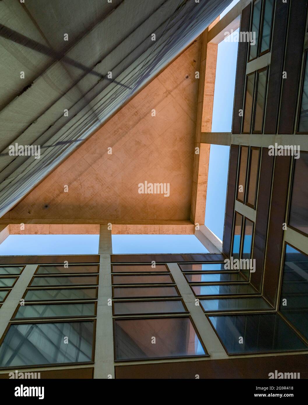 Triangular architecture with its columns in view Stock Photo - Alamy