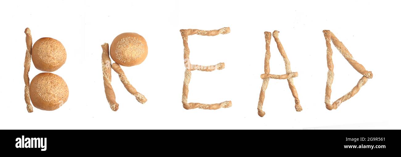 word BREAD made of different kinds of bread isolated on white ...