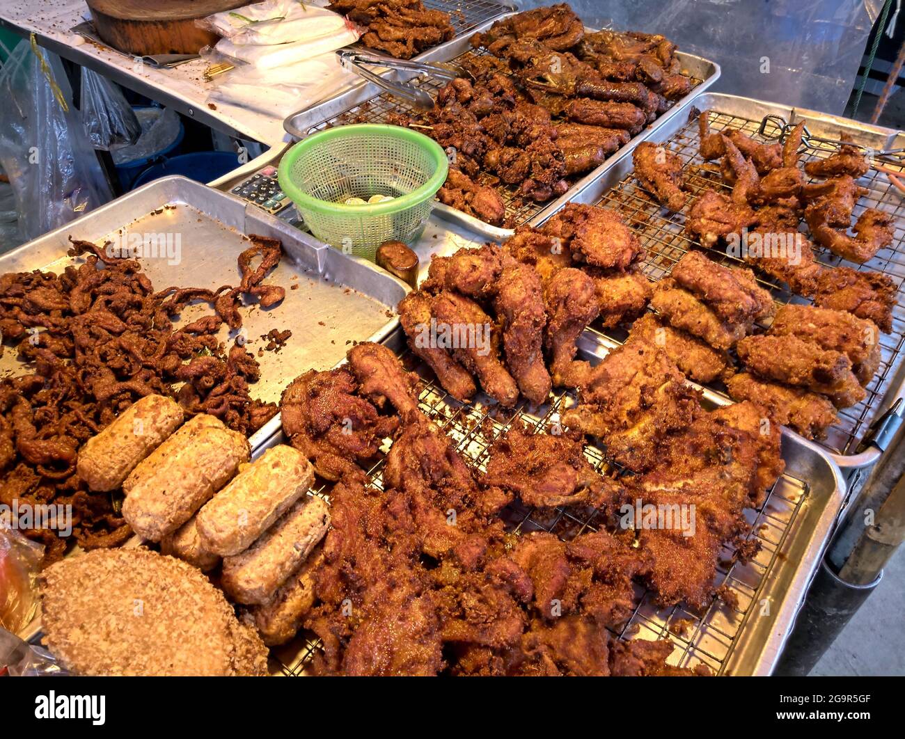A fried chicken shop is on the side of the road Stock Photo - Alamy