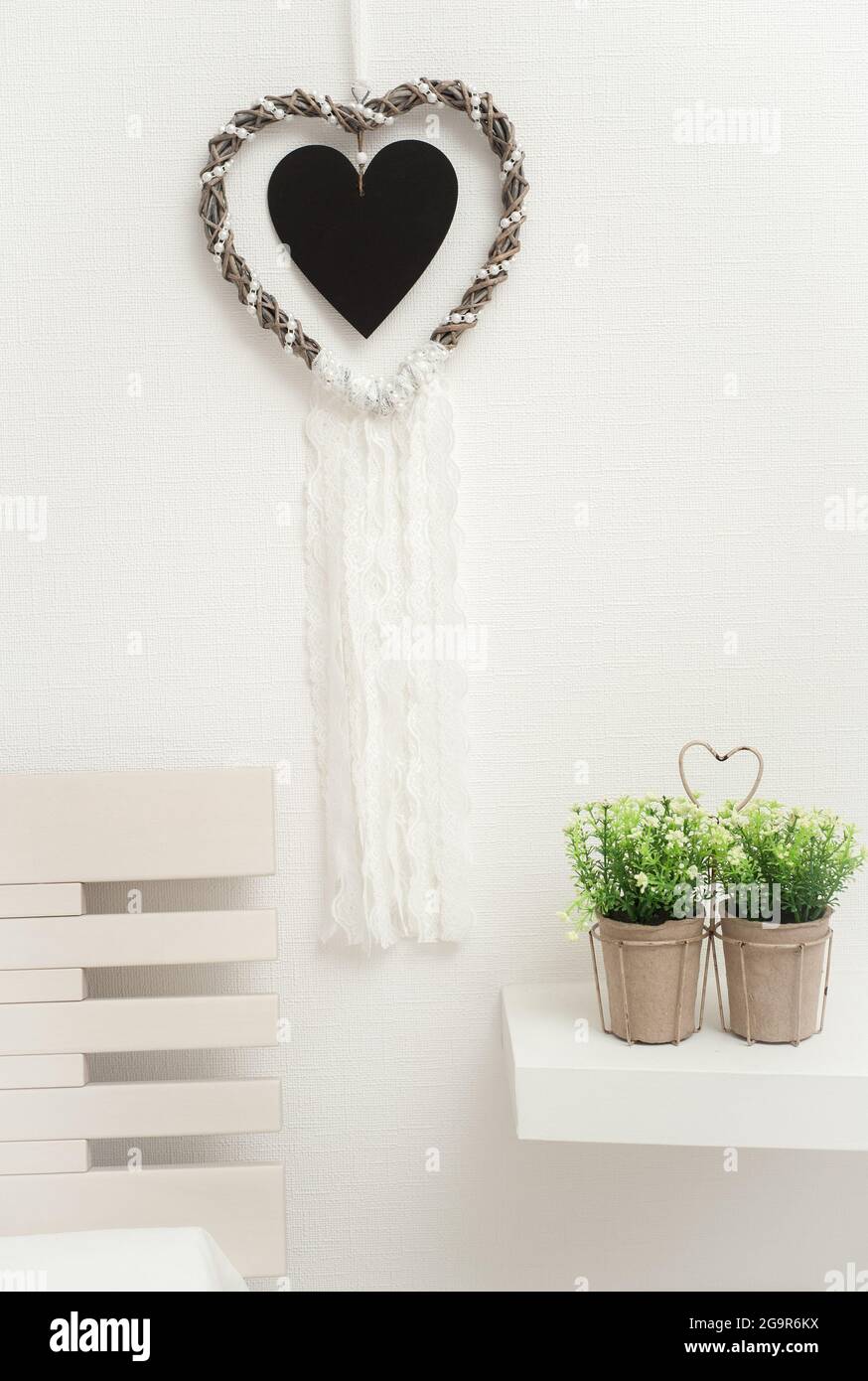 Brown dream catcher shaped heart with blackboard for text. Hanging in ...