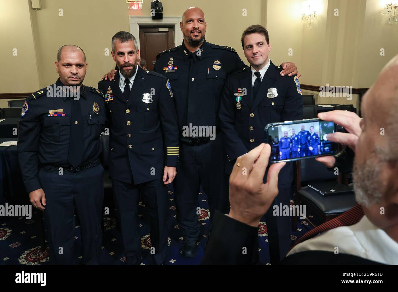 WASHINGTON, DC - JULY 27: (L-R) U.S. Capitol Police officer Sgt ...