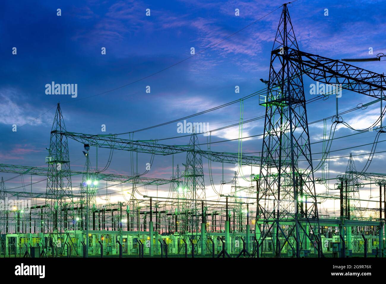 Electric substation at night Stock Photo - Alamy
