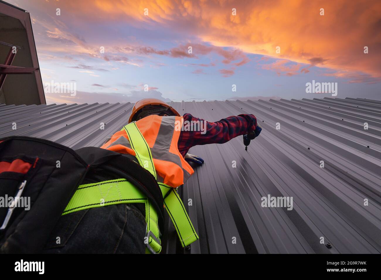 Roofer Construction worker install new roof,Roofing tools,Electric ...