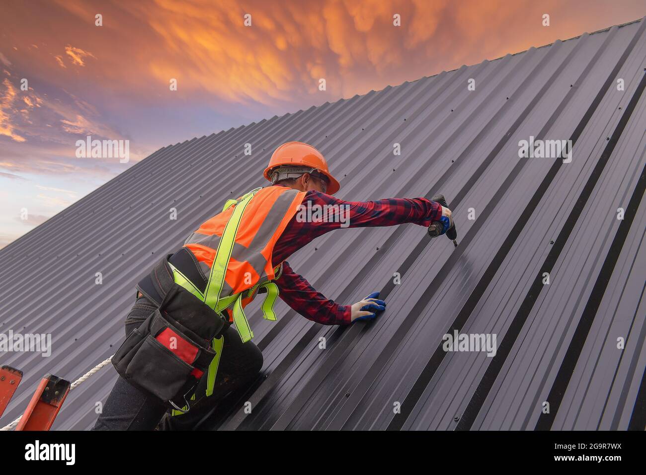 Roofer Construction worker install new roof,Roofing tools,Electric ...