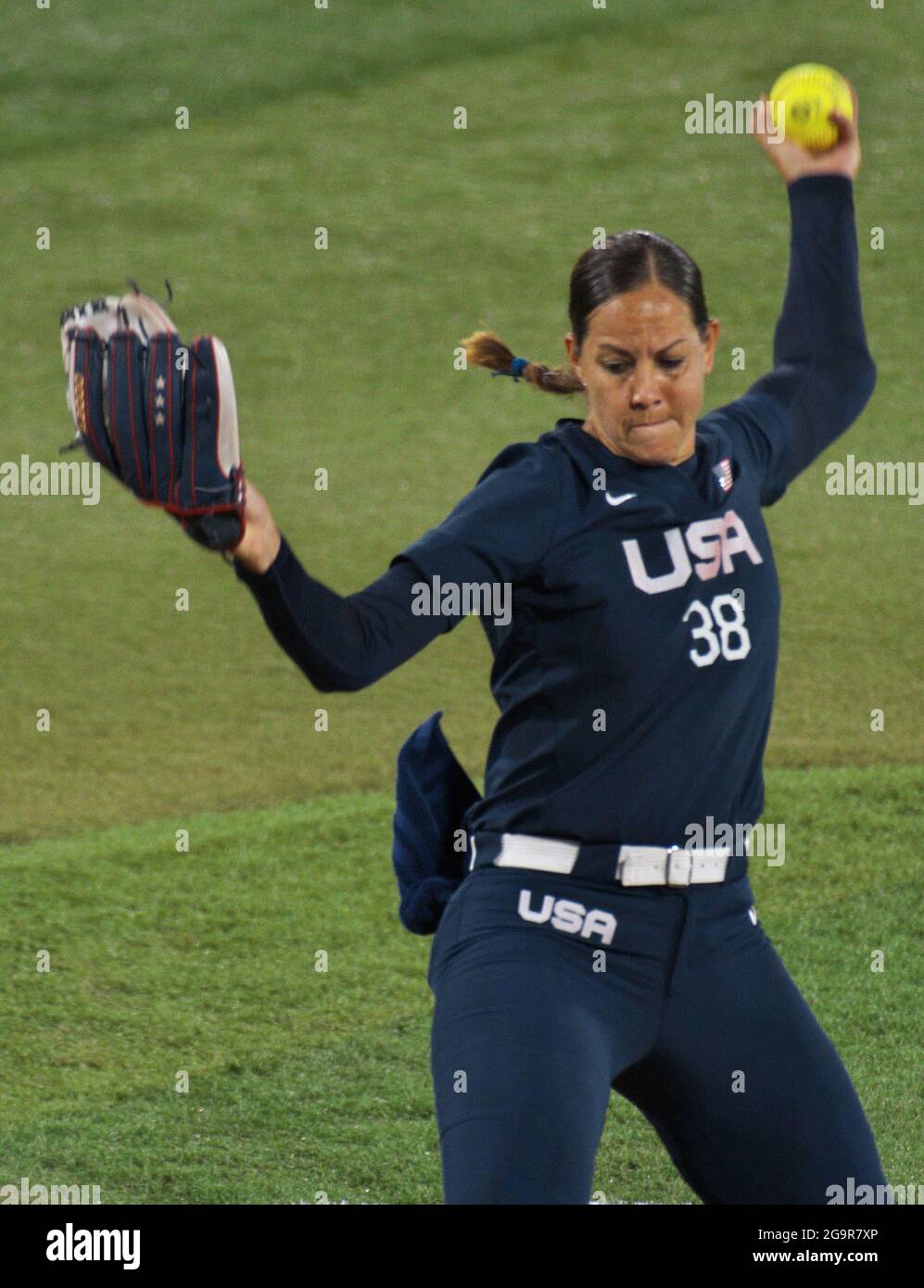 Tokyo, Japan. 27th July, 2021. USA's pitcher Cat Osterman hurls the ...
