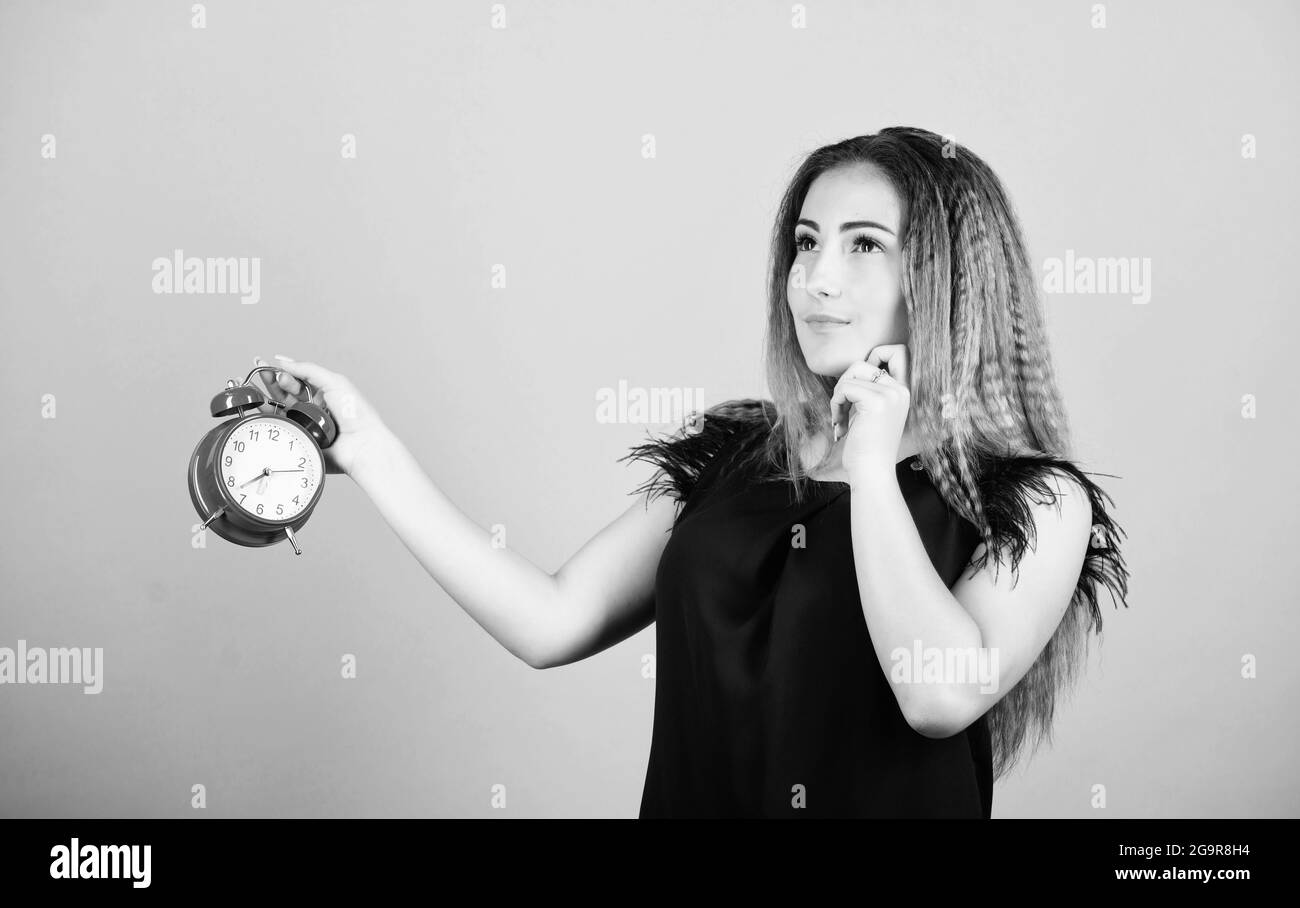 Pretty girl managing her time. Overwork or being late. Timing issues ...