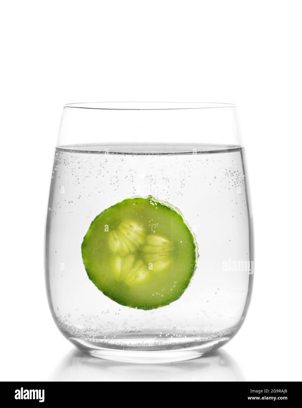 Glass with fresh cucumber, isolated on white Stock Photo - Alamy