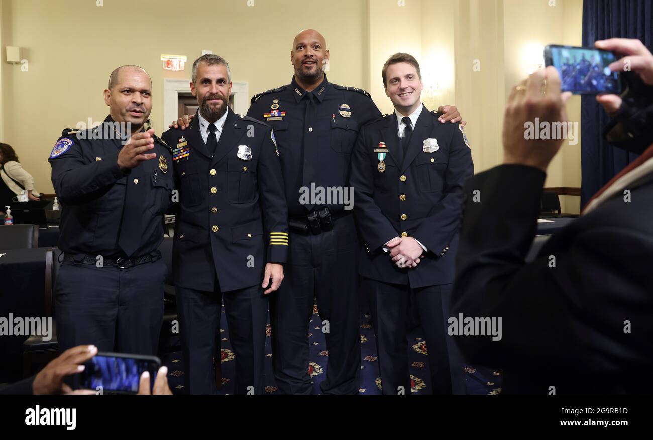 (L-R) Sgt. Aquilino Gonell of the US Capitol Police, Officer Michael ...