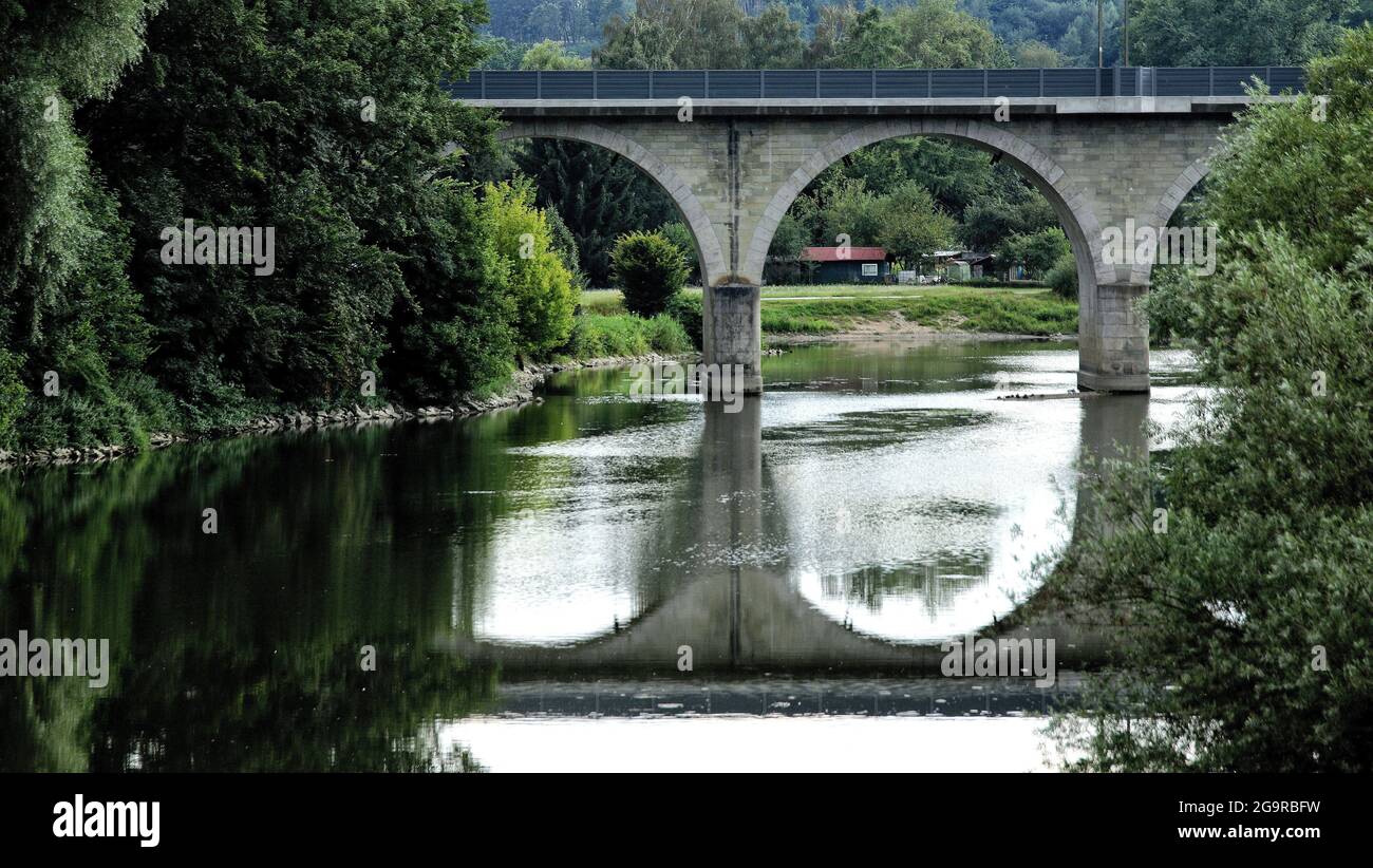 Beautiful landscape with an old bridge reflection on the river Stock ...