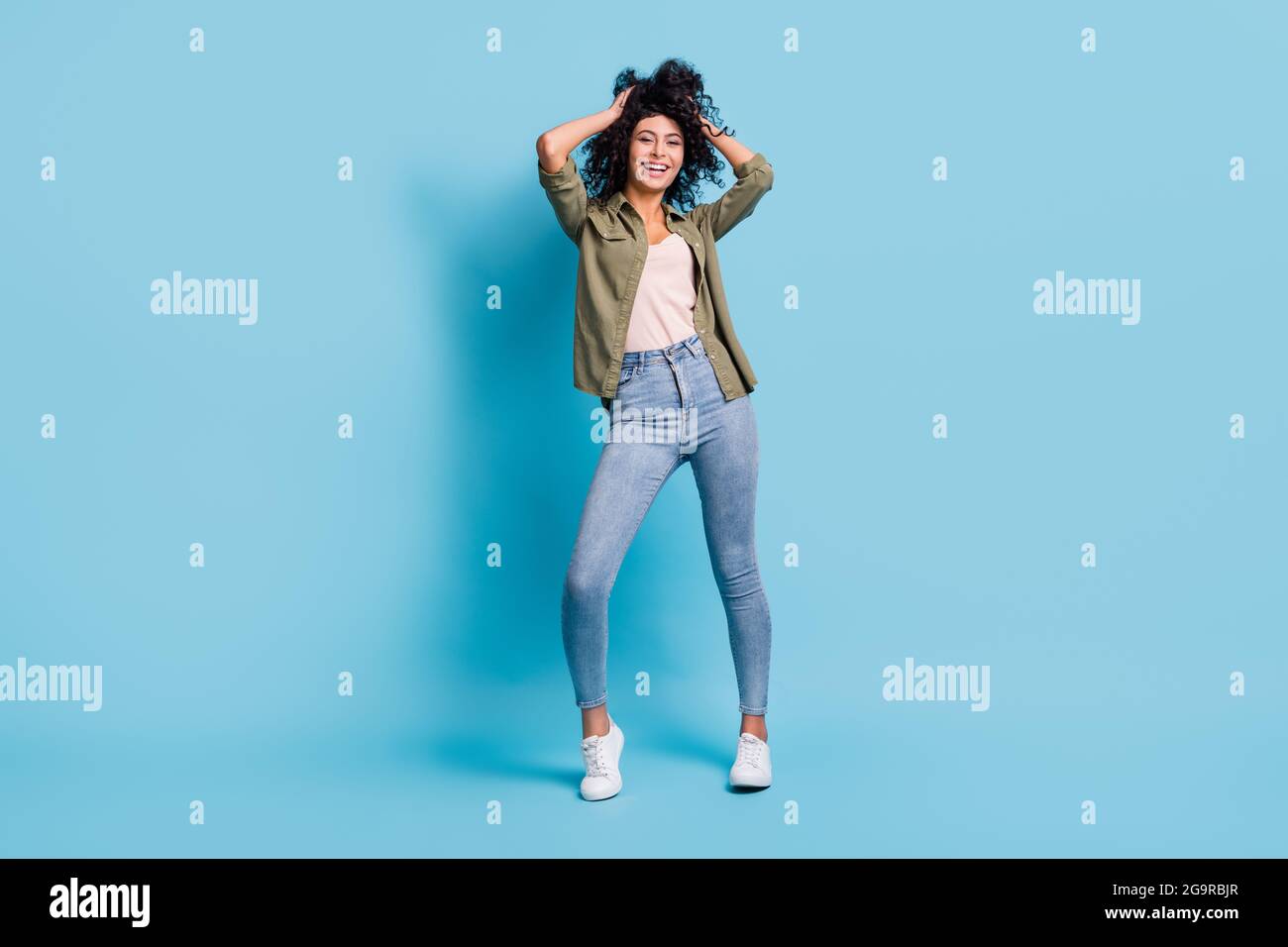 Full size photo of cool young person arms play with hair toothy smile ...