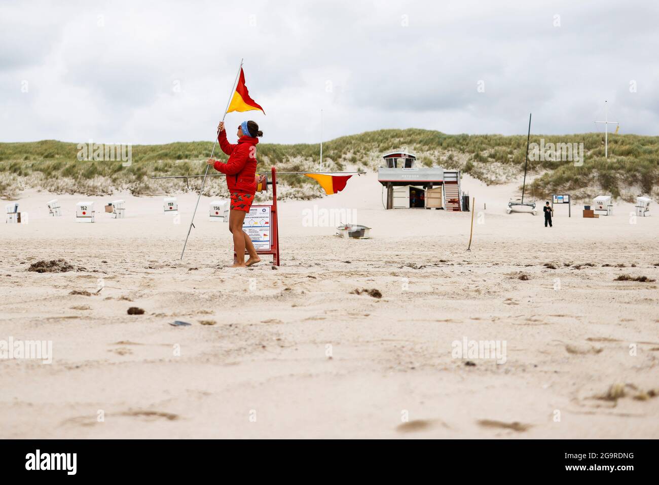 Kampen, Germany. 19th July, 2021. Lifeguard Jana Kubikova starts her ...