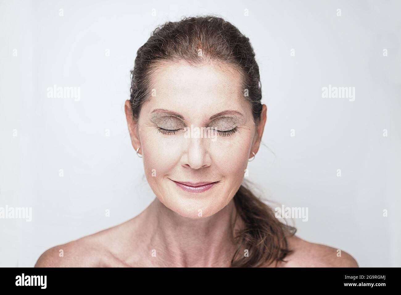 Portrait of caucasian woman with cracked lid suffers from dry eyes ...