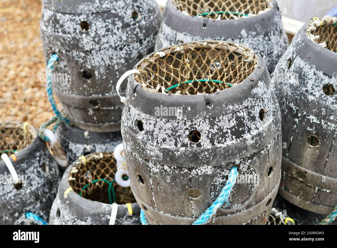Fishing nets, lobster pots, chains and floats are strewn around the ...