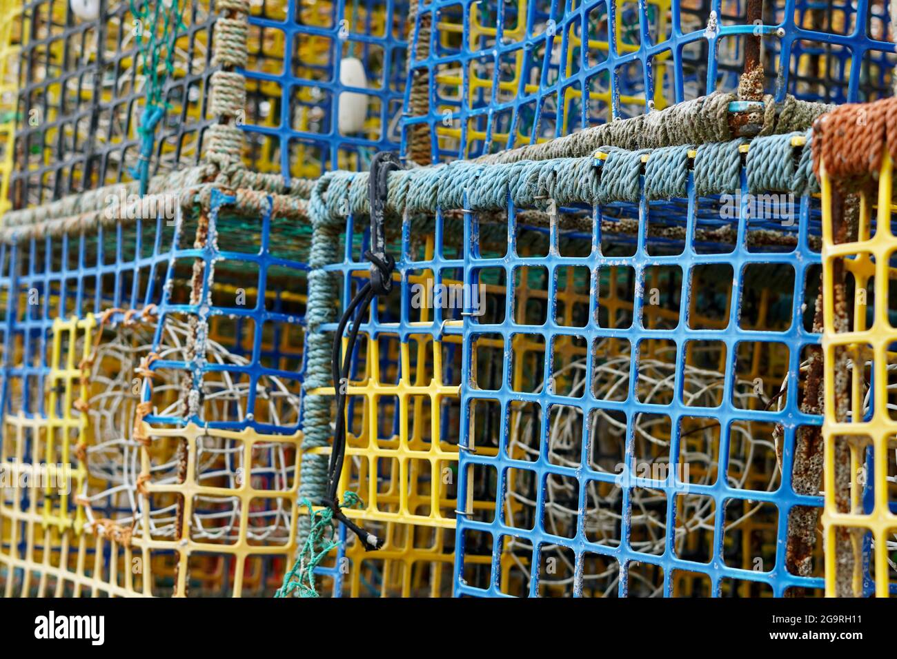 Fishing nets, lobster pots, chains and floats are strewn around the ...