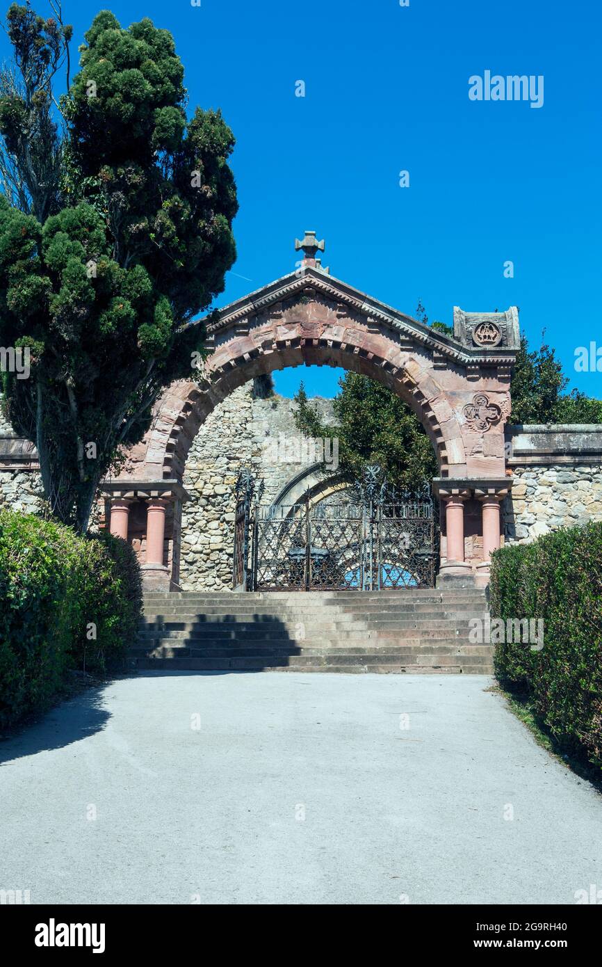 old entrance gate with railings, stone construction, driveway to ...