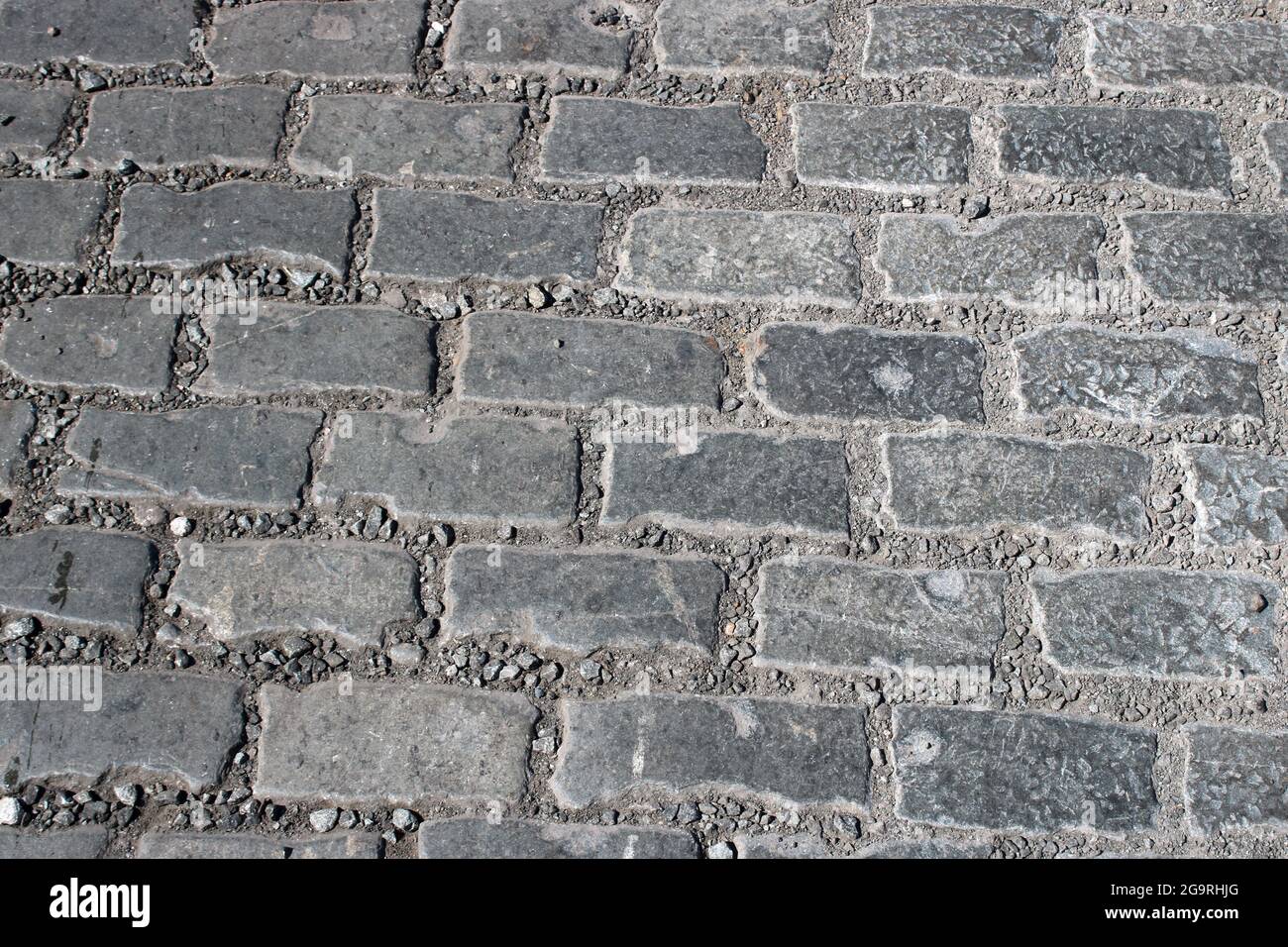 Pattern of old setts or rectangular stone cobbles that formed part of ...