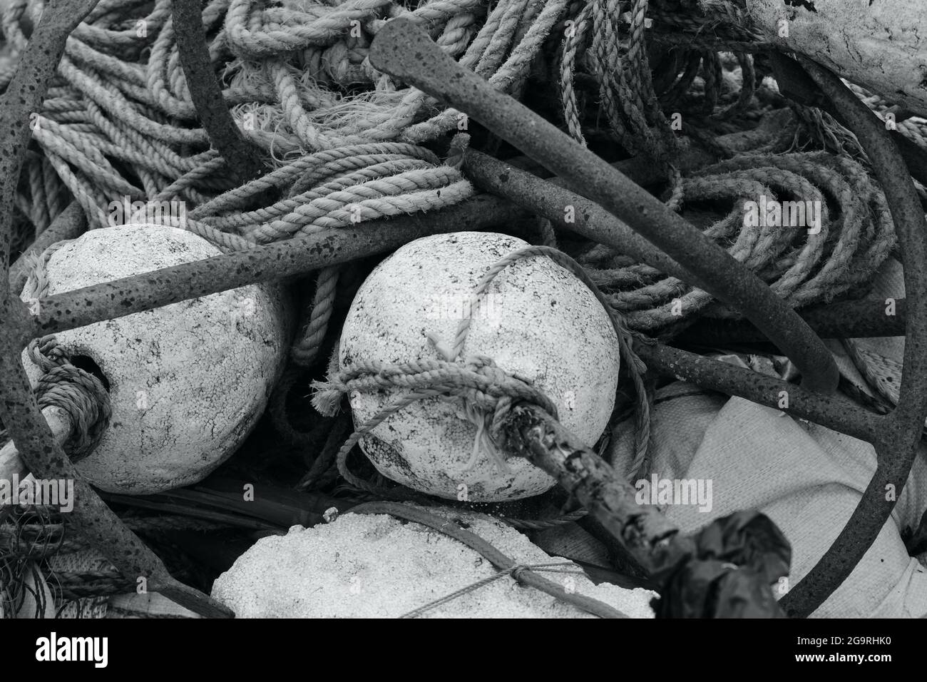 Fishing nets, lobster pots, chains and floats are strewn around the ...