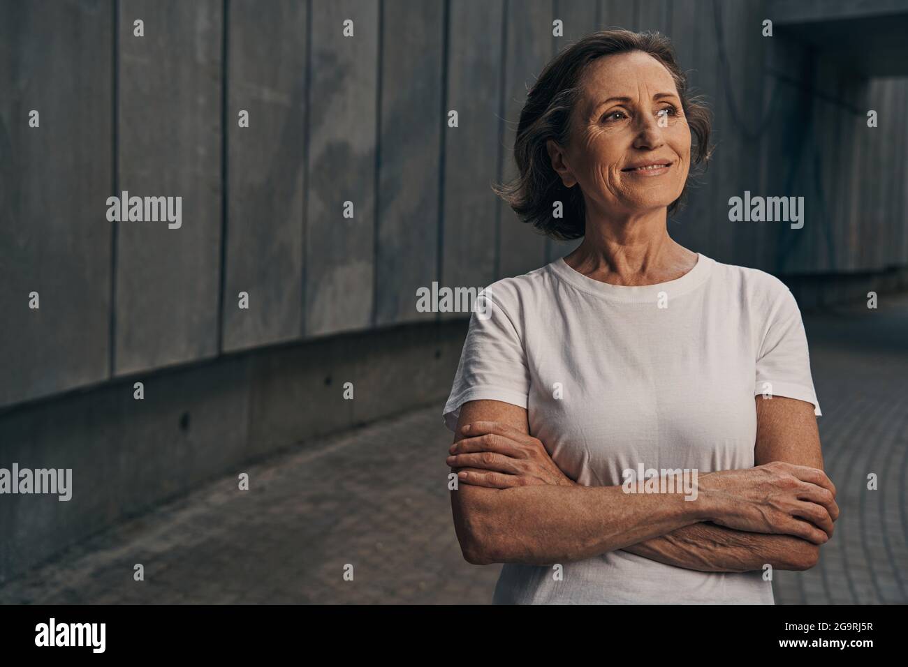 Jolly pretty elderly lady spending active day Stock Photo - Alamy