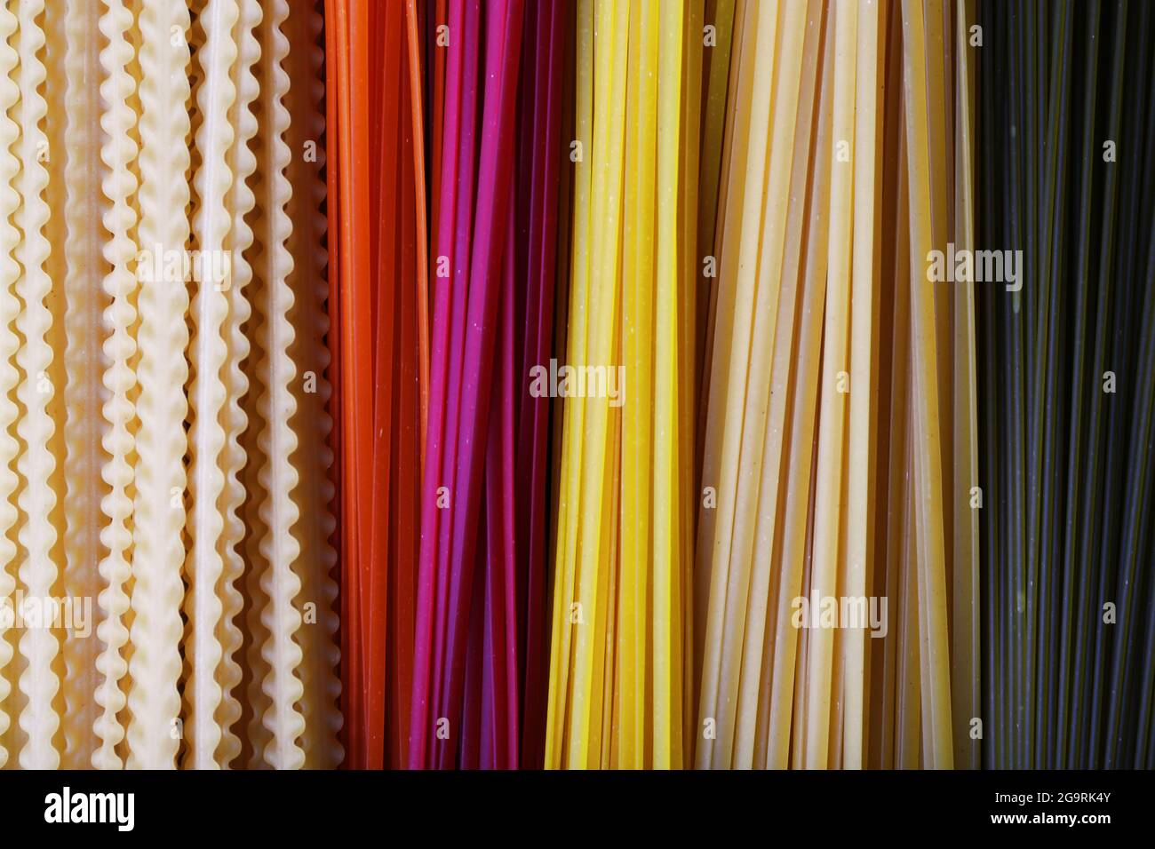 Different types of colorful pasta, macro view Stock Photo - Alamy