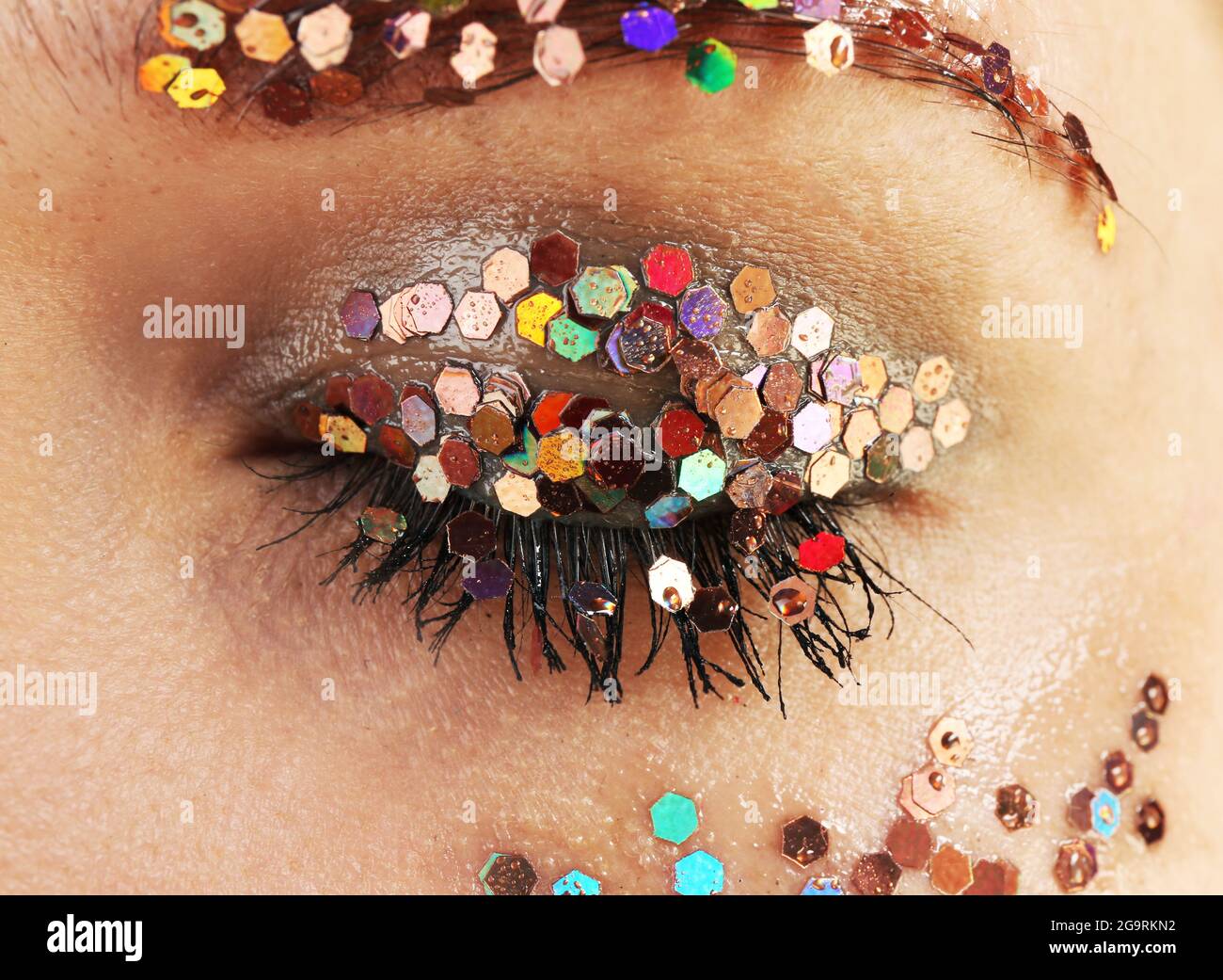 Female eye with fancy glitter makeup, macro view Stock Photo - Alamy