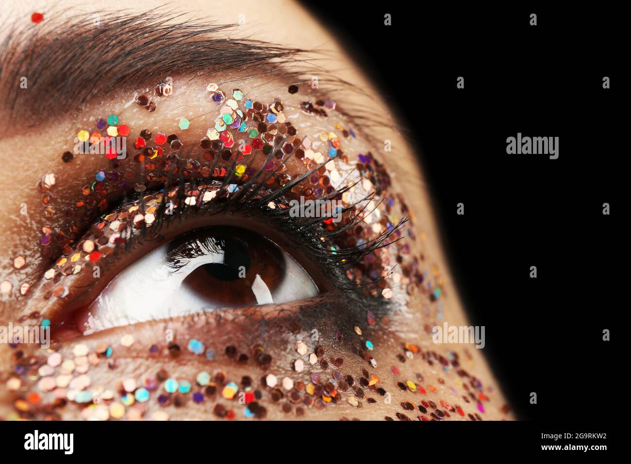 Female eye with fancy glitter makeup, macro view Stock Photo - Alamy