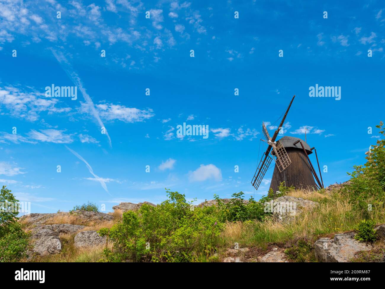 Wide angle photo of an old traditional wooden flour windmill Stock ...